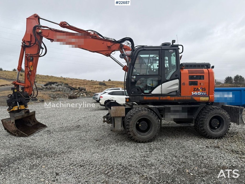 Hitachi zx145W wheeled machine w/ rototilt w/grab box, sanding bucket ch bager točkaš