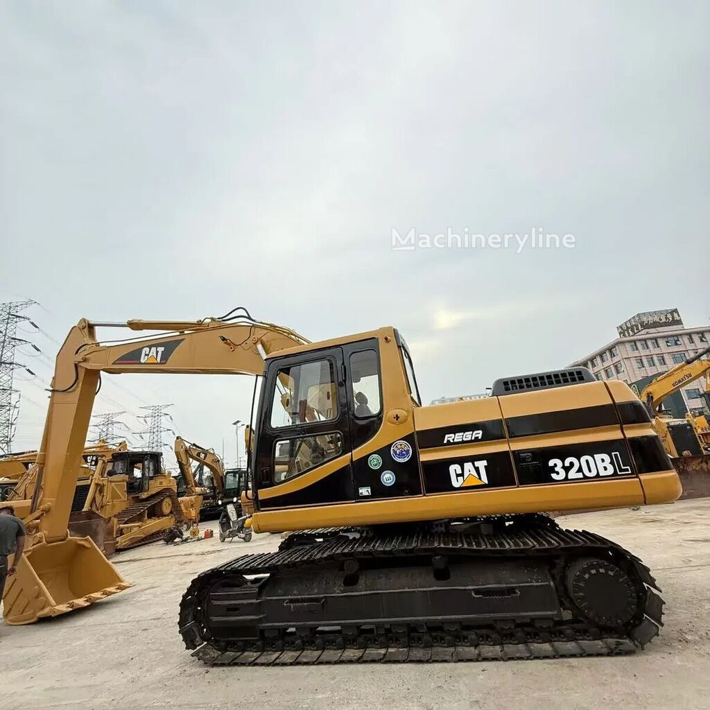 Caterpillar 320BL bager guseničar
