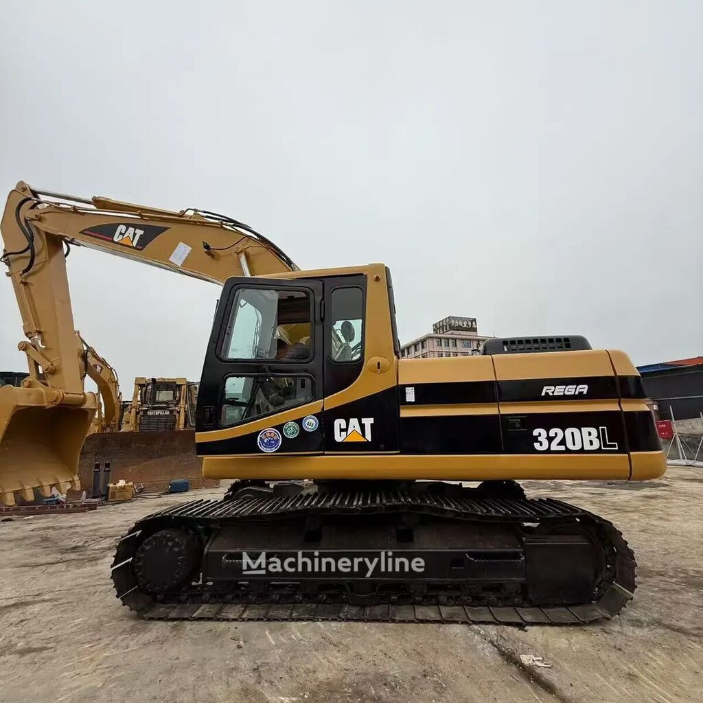 Caterpillar 320bl bager guseničar