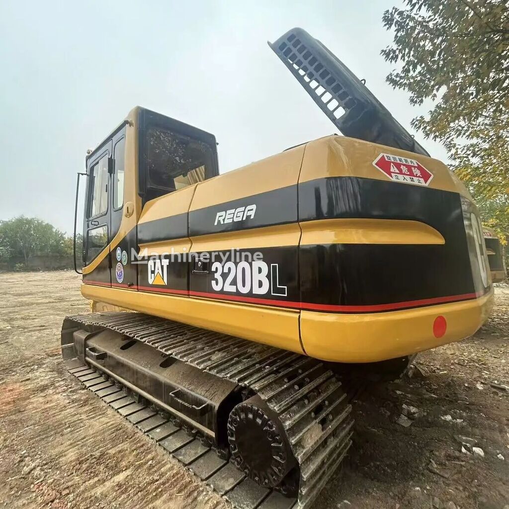 Caterpillar 320bl bager guseničar