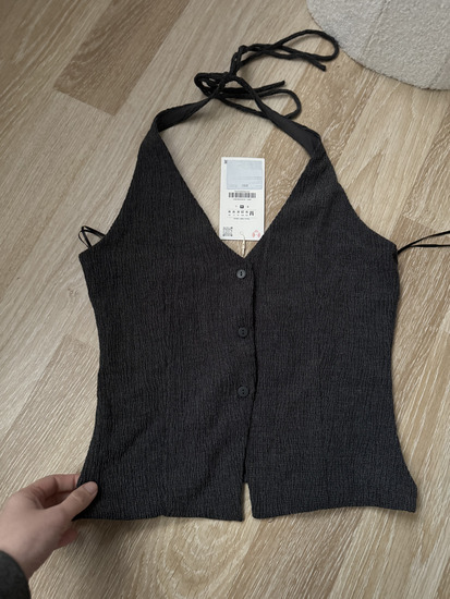 Nov zara sivi prsluk M