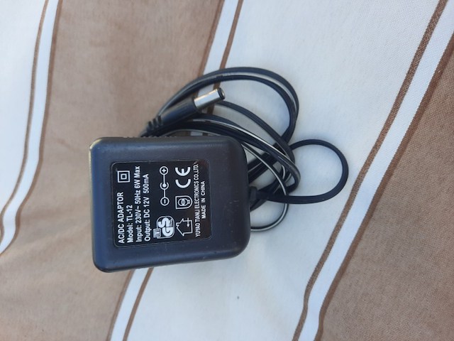 Adapter AC(Yuyao Tianli Electronics TL-12)12 V