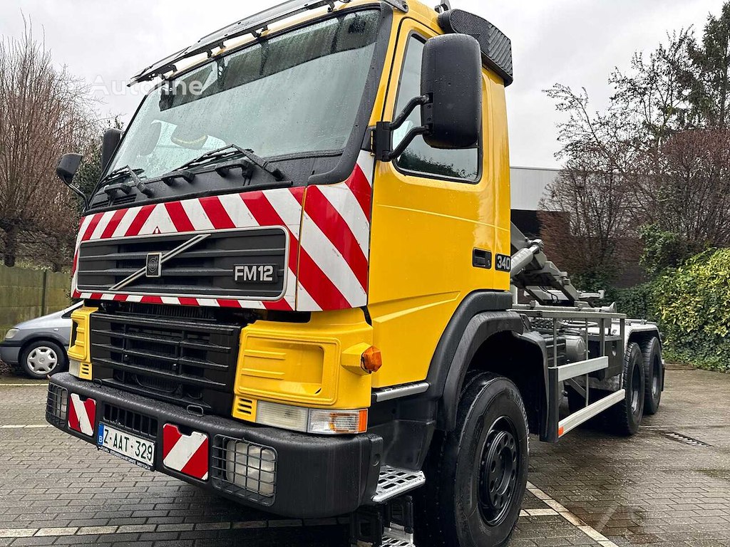 Prodaje se Volvo FM12 6X6R rol kiper sa kukom na aukciji