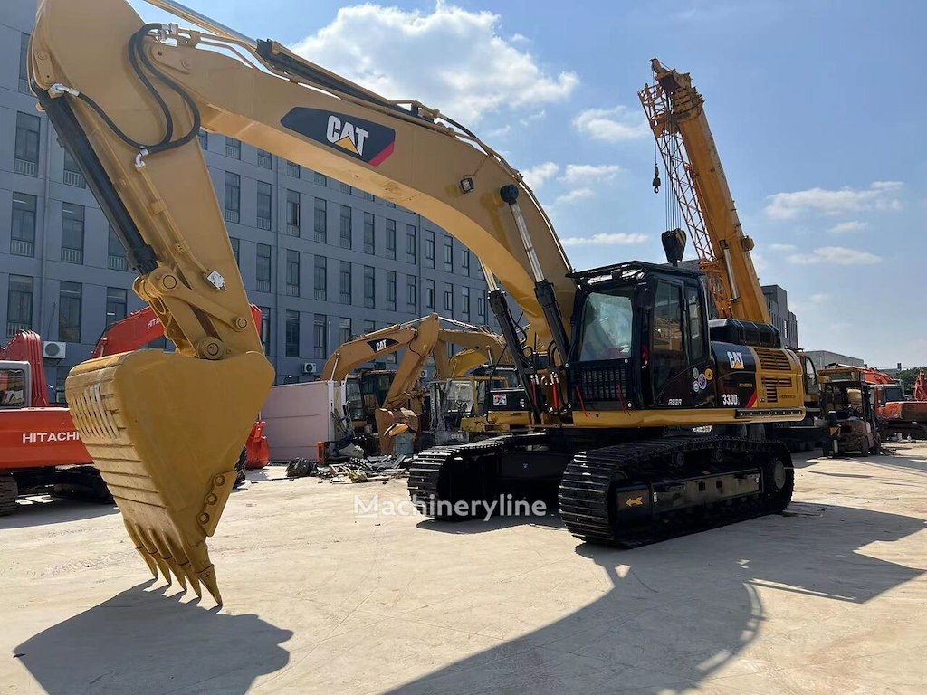 Caterpillar 330DL bager guseničar