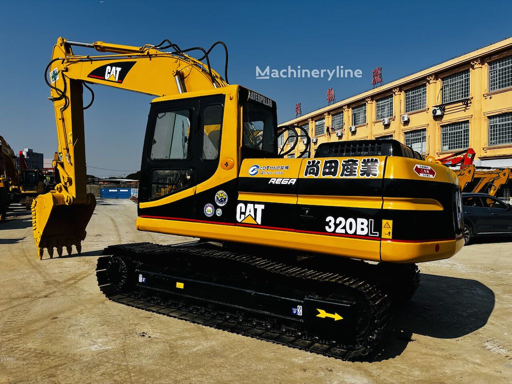 Caterpillar 320BL bager guseničar