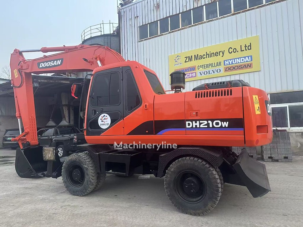 Doosan DX210W bager točkaš