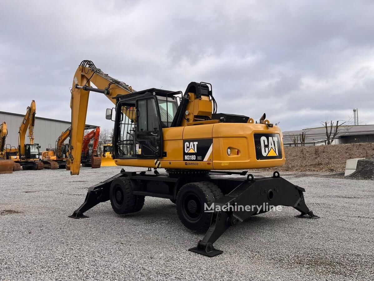 Caterpillar M318D MH bager za pretovar