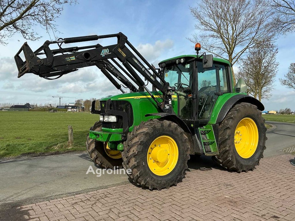 Prodaje se John Deere 6820 traktor točkaš na aukciji
