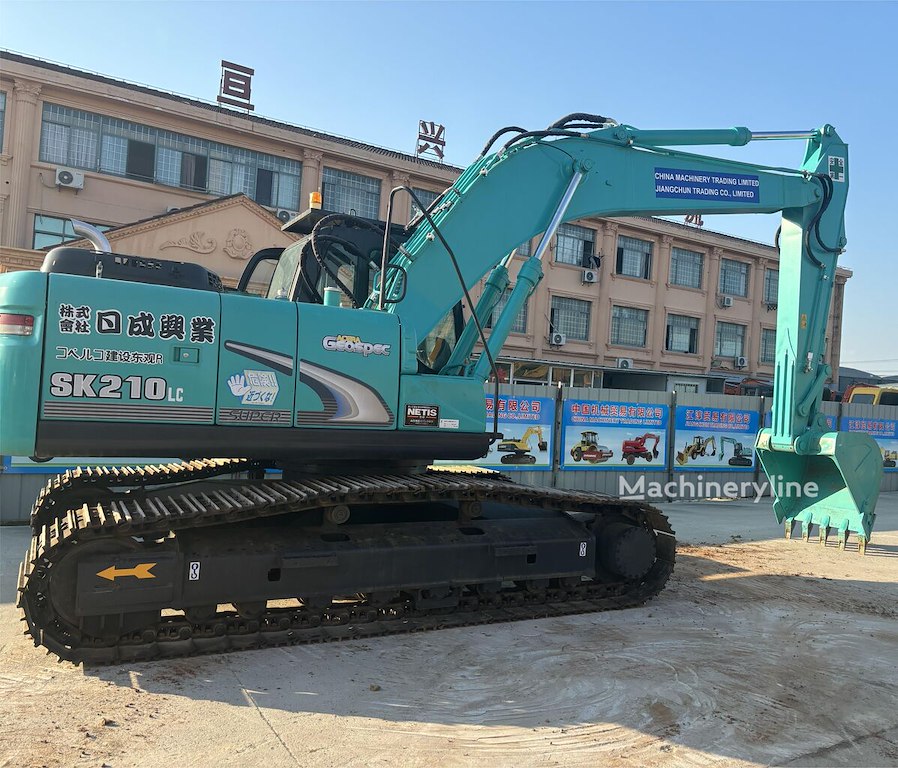 Kobelco SK210 bager guseničar