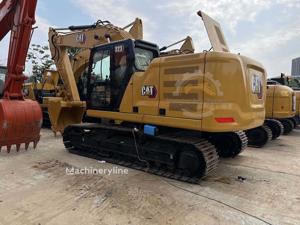 Caterpillar 323 bager guseničar