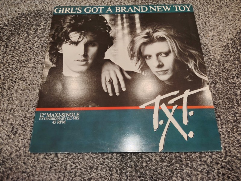 T.X.T. - Girl`s Got A Brand New Toy (1985)