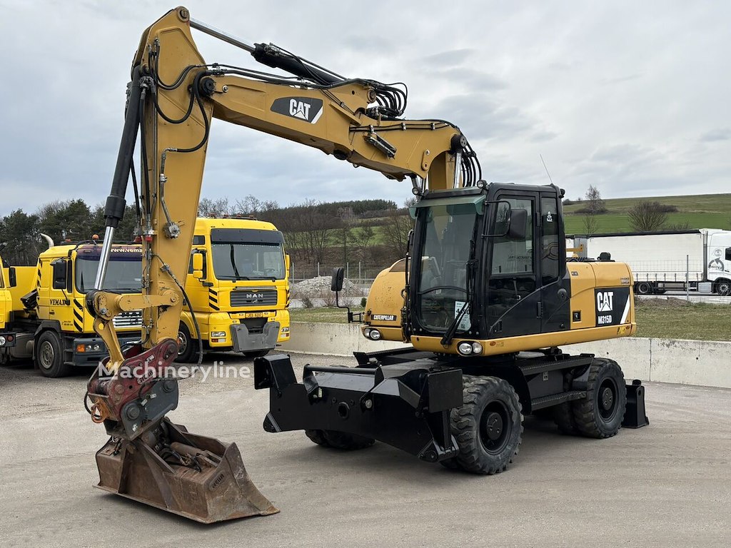Caterpillar M315D bager točkaš