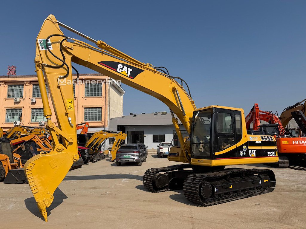 Caterpillar 320BL bager guseničar