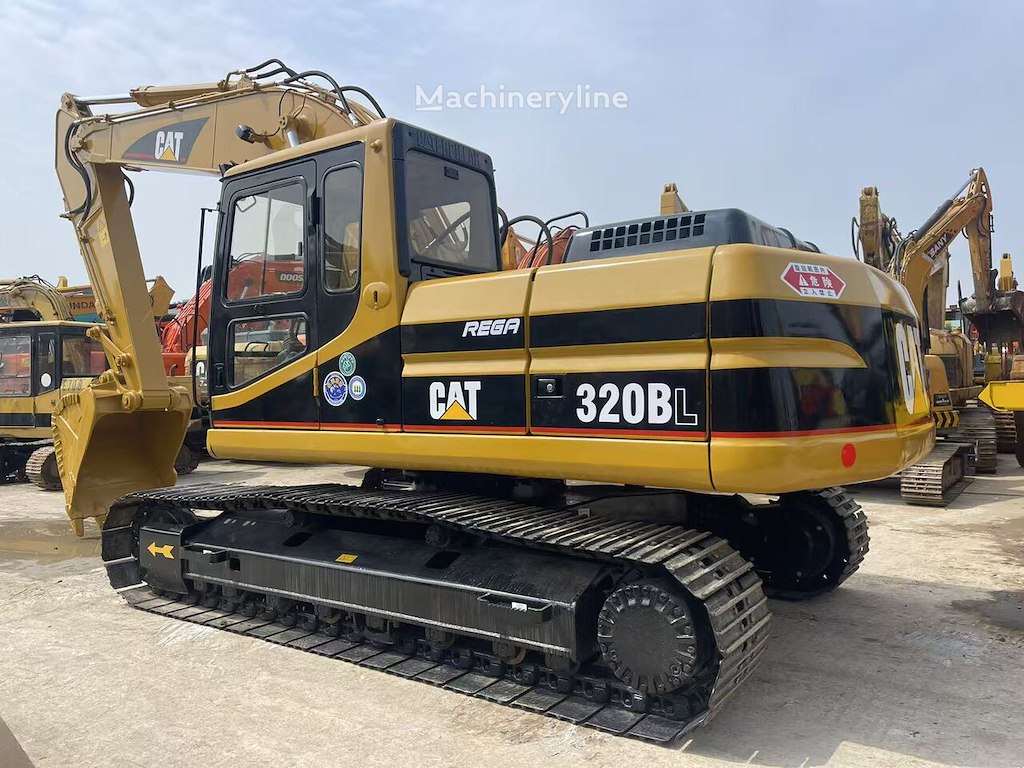 Caterpillar 320BL bager guseničar