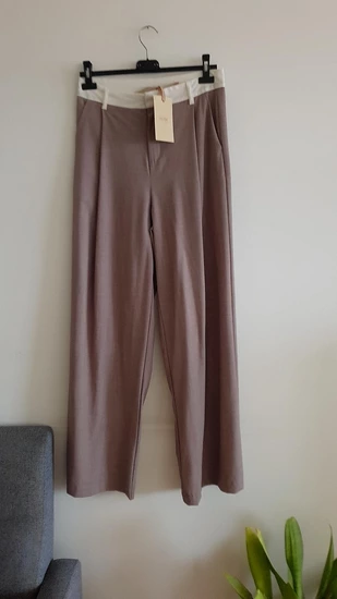 Italijanske pantalone nove m