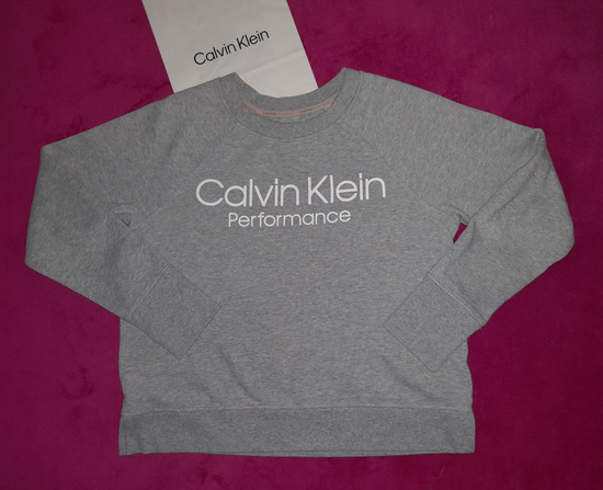 Calvin Klein sivi duks beli logo S/M%
