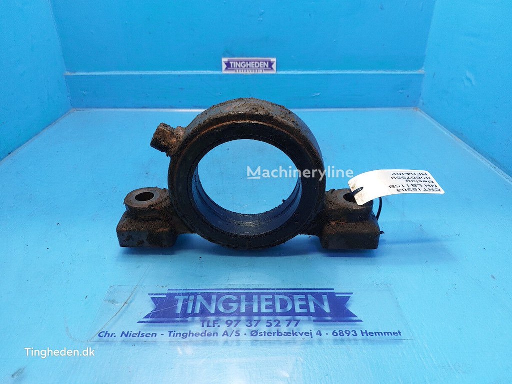 Držač amortizera za New Holland LB115B bagera-utovarivača