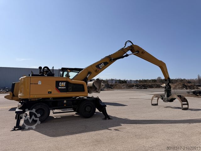 Bager-manipulator za materijale
Caterpillar MH3024