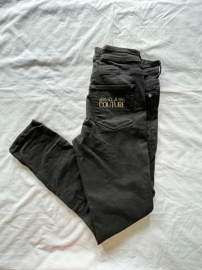 Versace original crne pantalone M/L