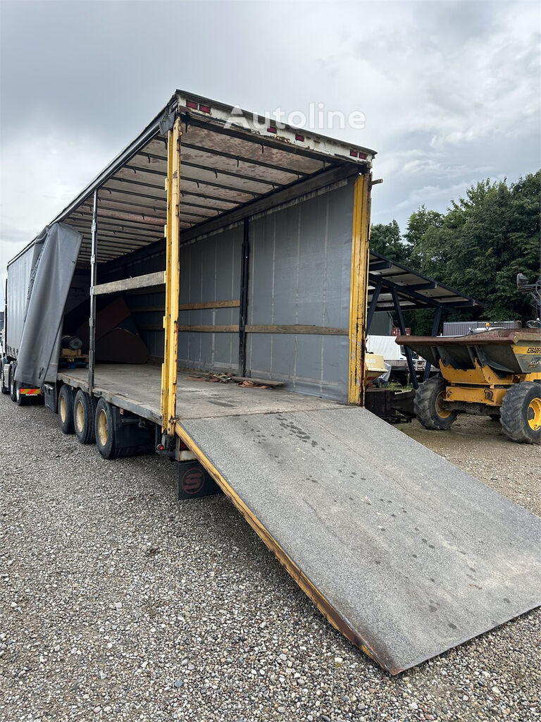 Schmitz Cargobull Machine transport trailer with big ramp poluprikolica sa kliznom ceradom