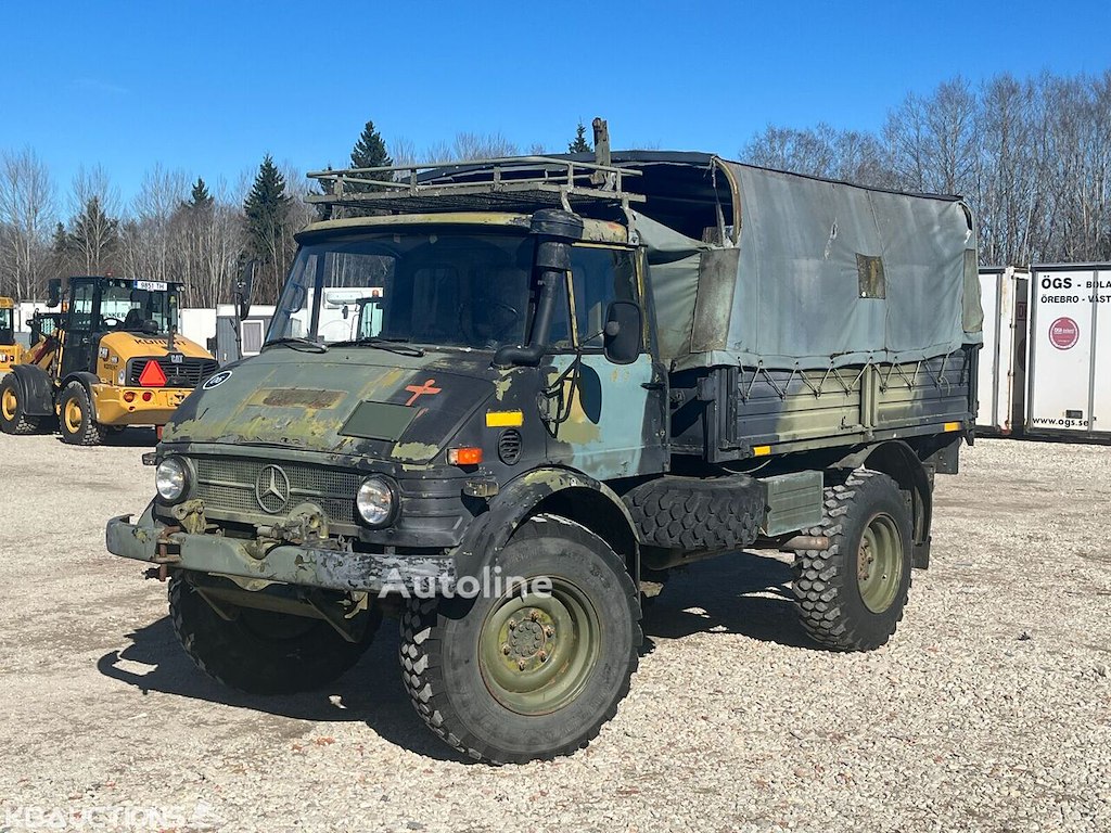 Prodaje se Mercedes-Benz Unimog 416 kamion s ceradom na aukciji