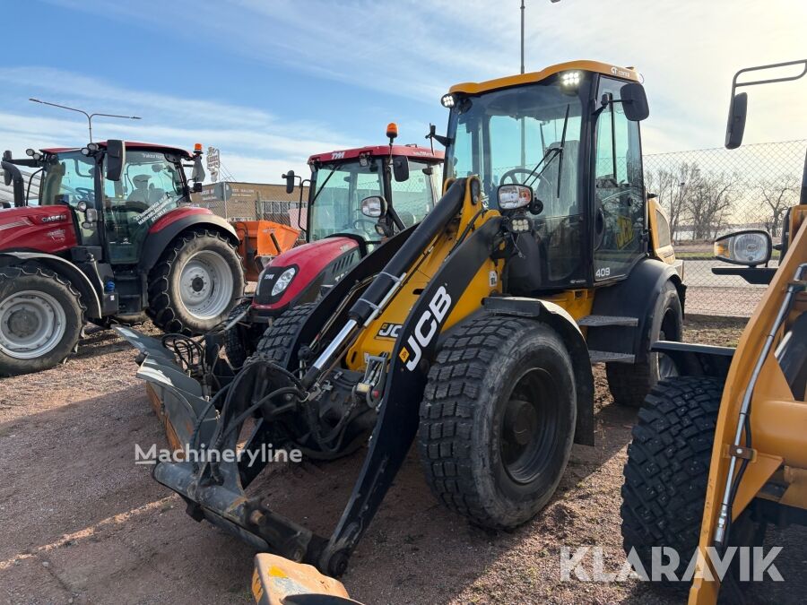 Prodaje se JCB 409 T4 prednji utovarivač na aukciji