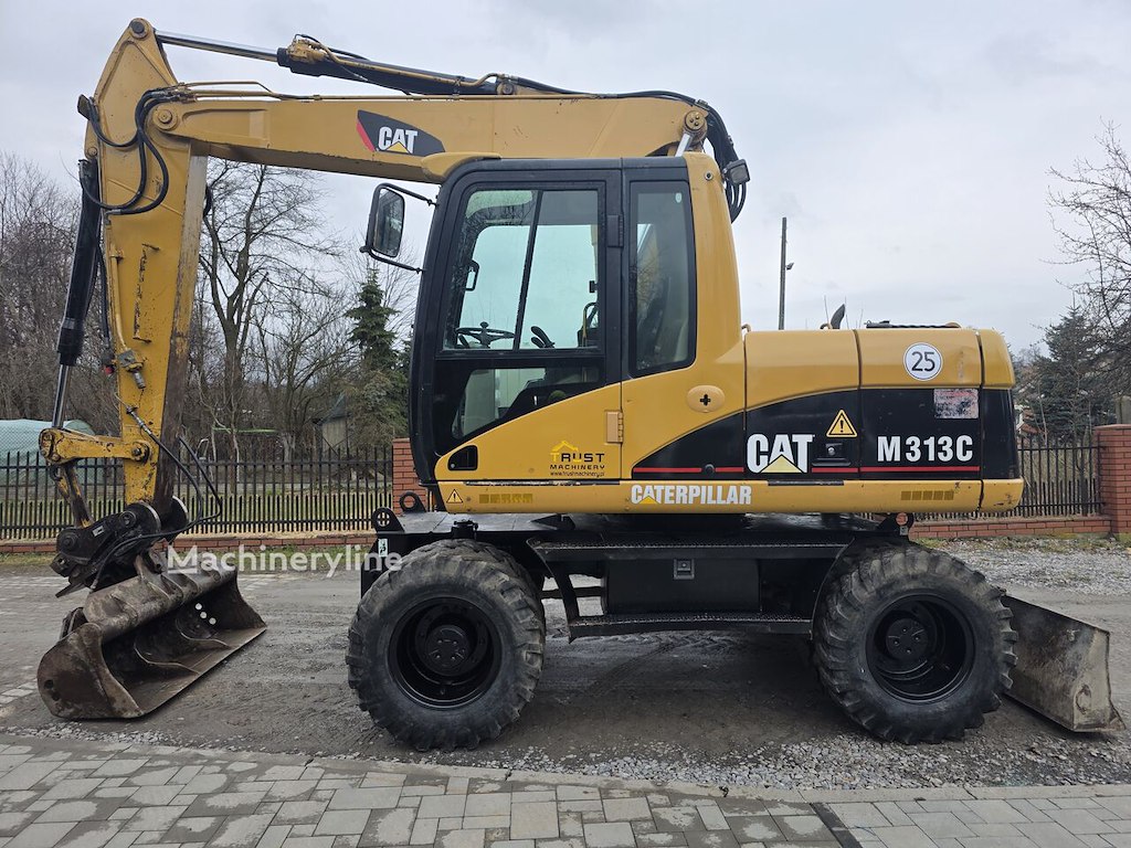 Caterpillar 313C bager točkaš