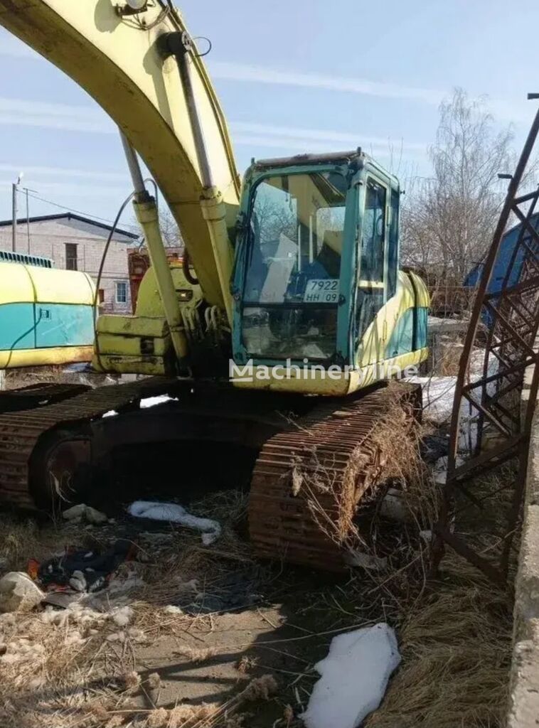 Caterpillar 320DL bager guseničar