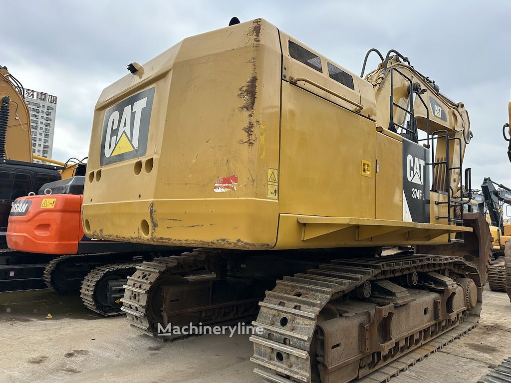 Caterpillar 374 bager guseničar