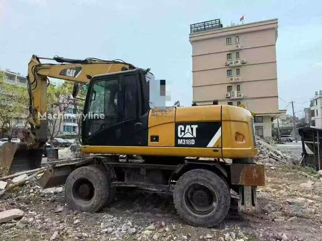 Caterpillar M315D bager točkaš