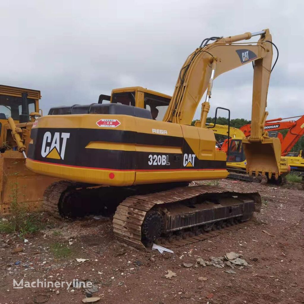 Caterpillar 320BL bager guseničar