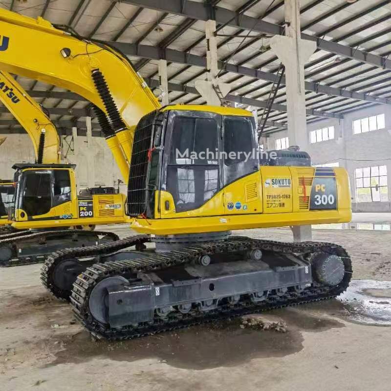 Komatsu PC130 bager guseničar