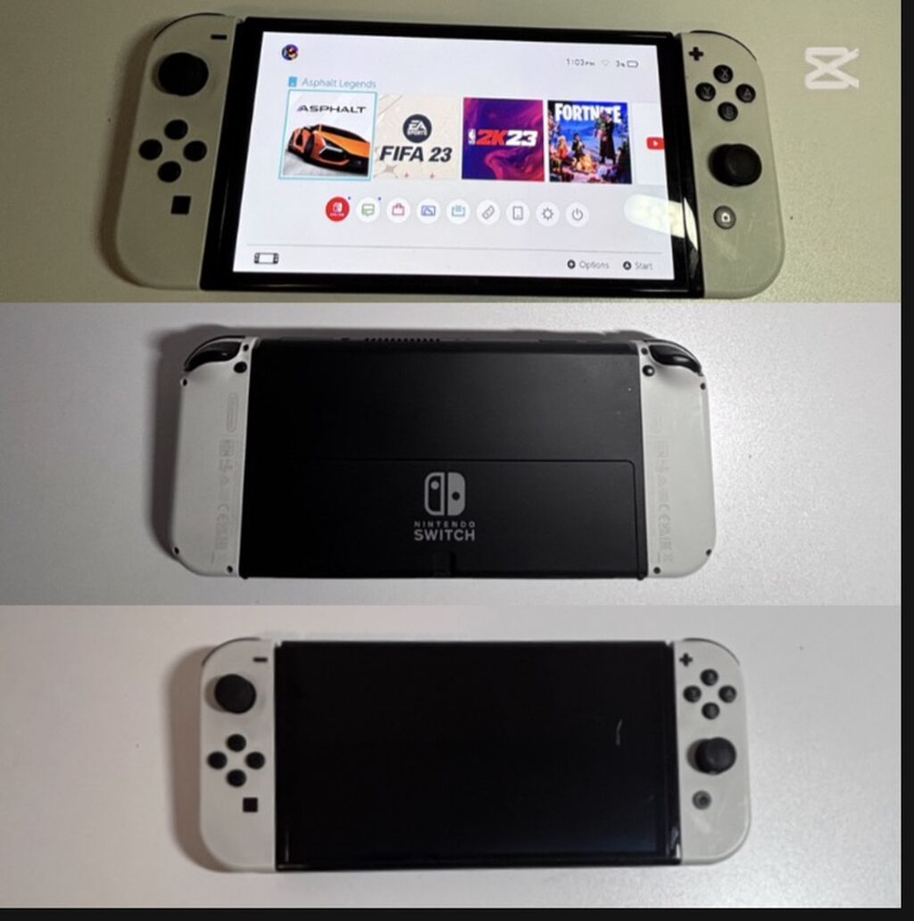 Nintendo Switch OLED (belo-crna varijanta) + dodatna oprema - Konzola