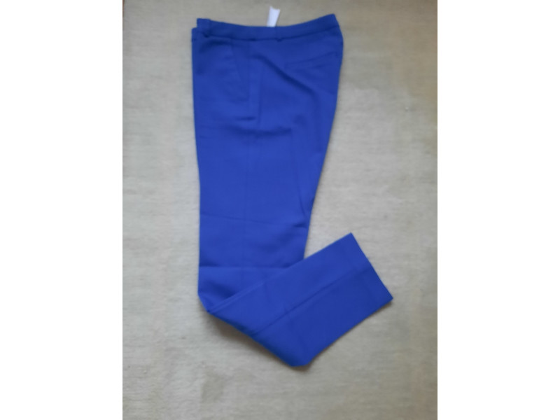 Tamnije modro plave pantalone bel.38