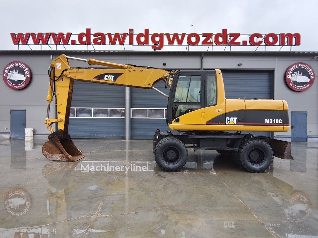 Caterpillar M318C bager točkaš