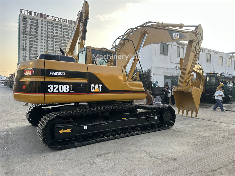 Caterpillar 320BL bager guseničar