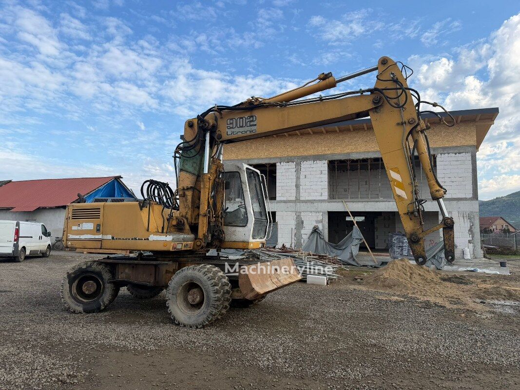 Liebherr 902 bager točkaš po rezervnim delovima