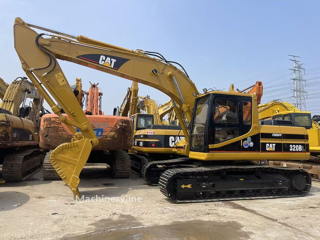 Caterpillar 320BL bager guseničar