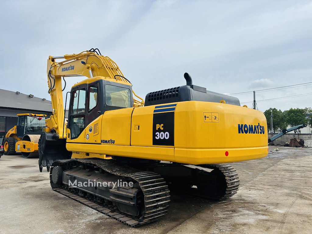 Komatsu PC300 bager guseničar