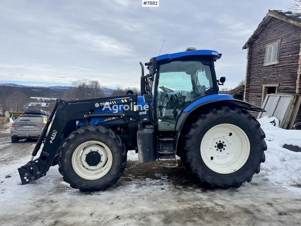 New Holland TS115A traktor točkaš