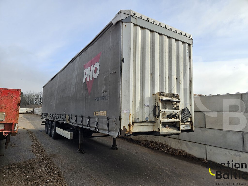 Prodaje se Krone SD poluprikolicu sa kliznom ceradom na aukciji