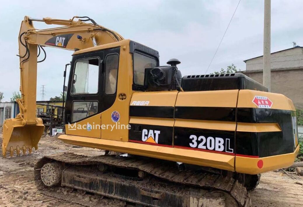 Caterpillar 320BL bager guseničar