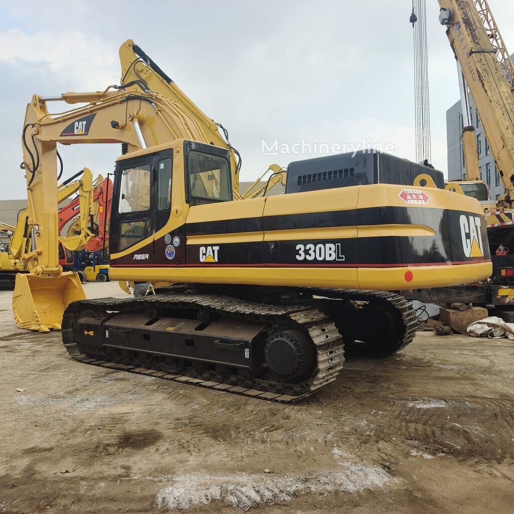 Caterpillar 330BL bager guseničar