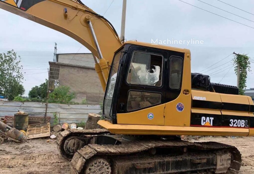 Caterpillar 320B bager guseničar