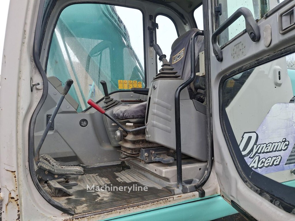 Kobelco SK210 bager guseničar