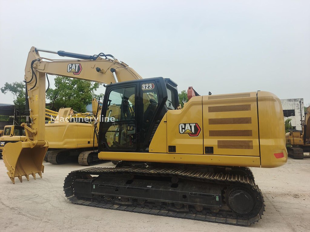 Caterpillar 323 bager guseničar