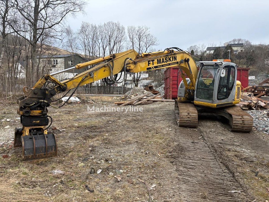 Prodaje se New Holland E135SR bager guseničar na aukciji