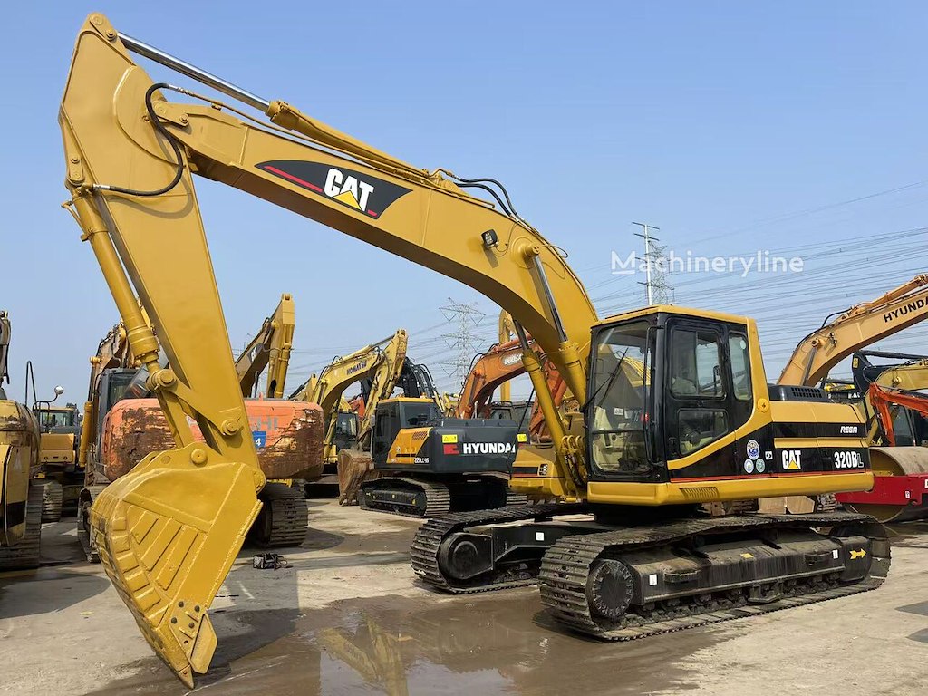 Caterpillar 320BL bager guseničar