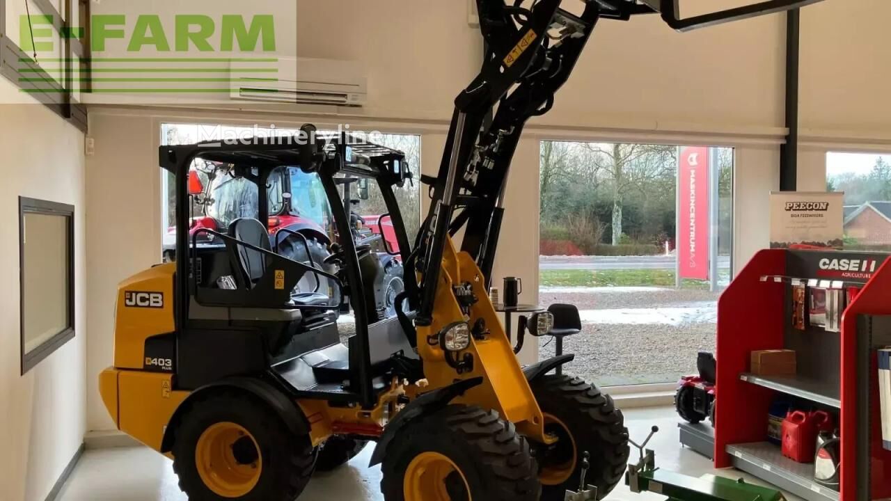 JCB 403 plus agri med jst skovl og pallegaffel multifunkcionalni utovarivač