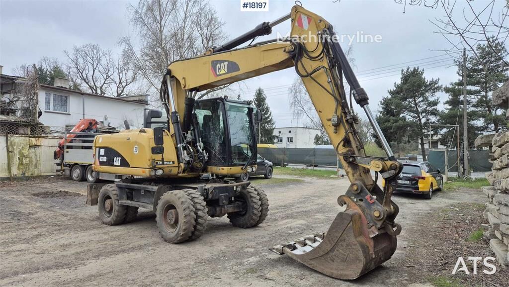 Caterpillar M318D bager točkaš